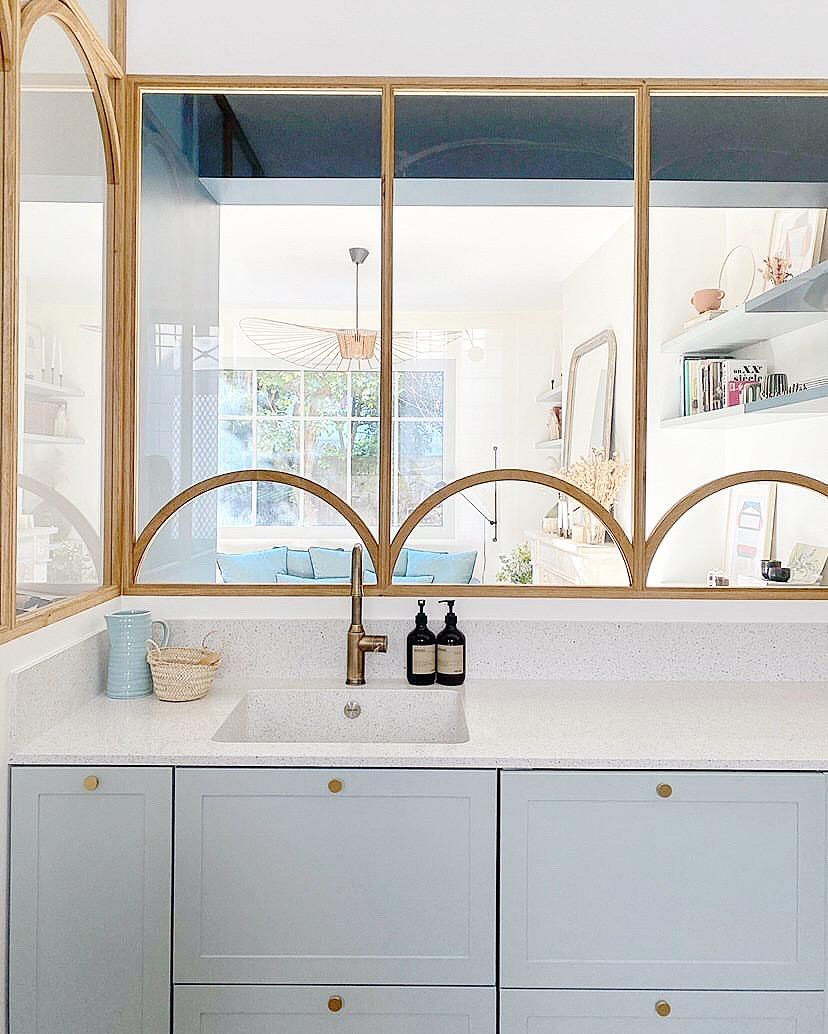 A glass partition in the kitchen | Plum Living